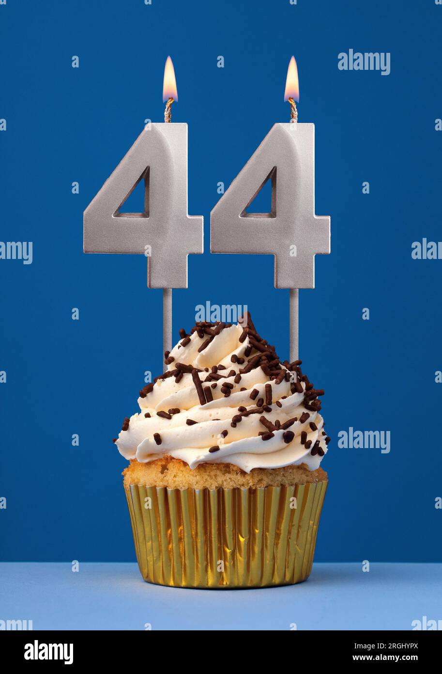 Horizontal birthday card with cake - Lit candle number 44 on blue ...
