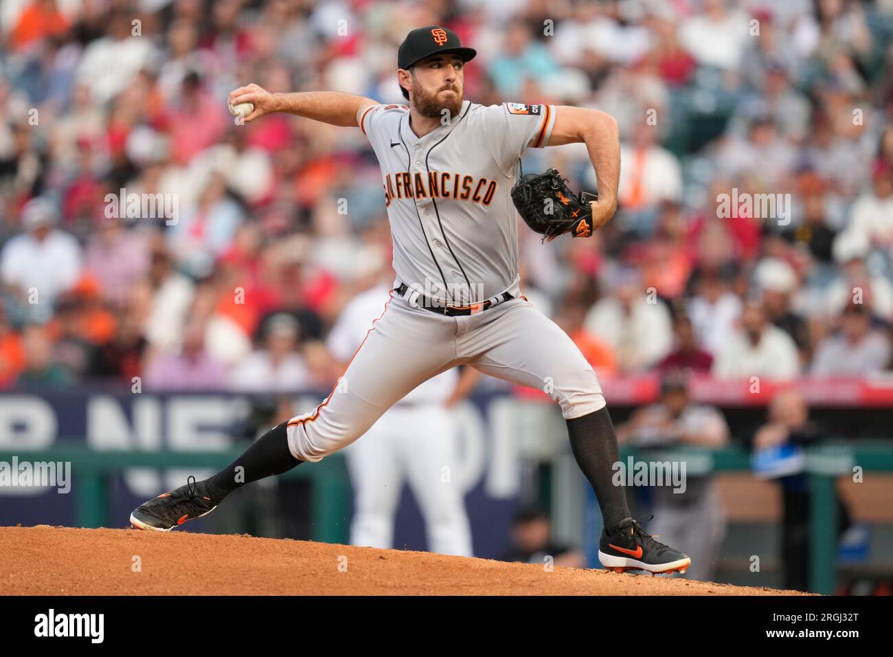 San Francisco Giants starting pitcher Ryan Walker (74) throws during ...