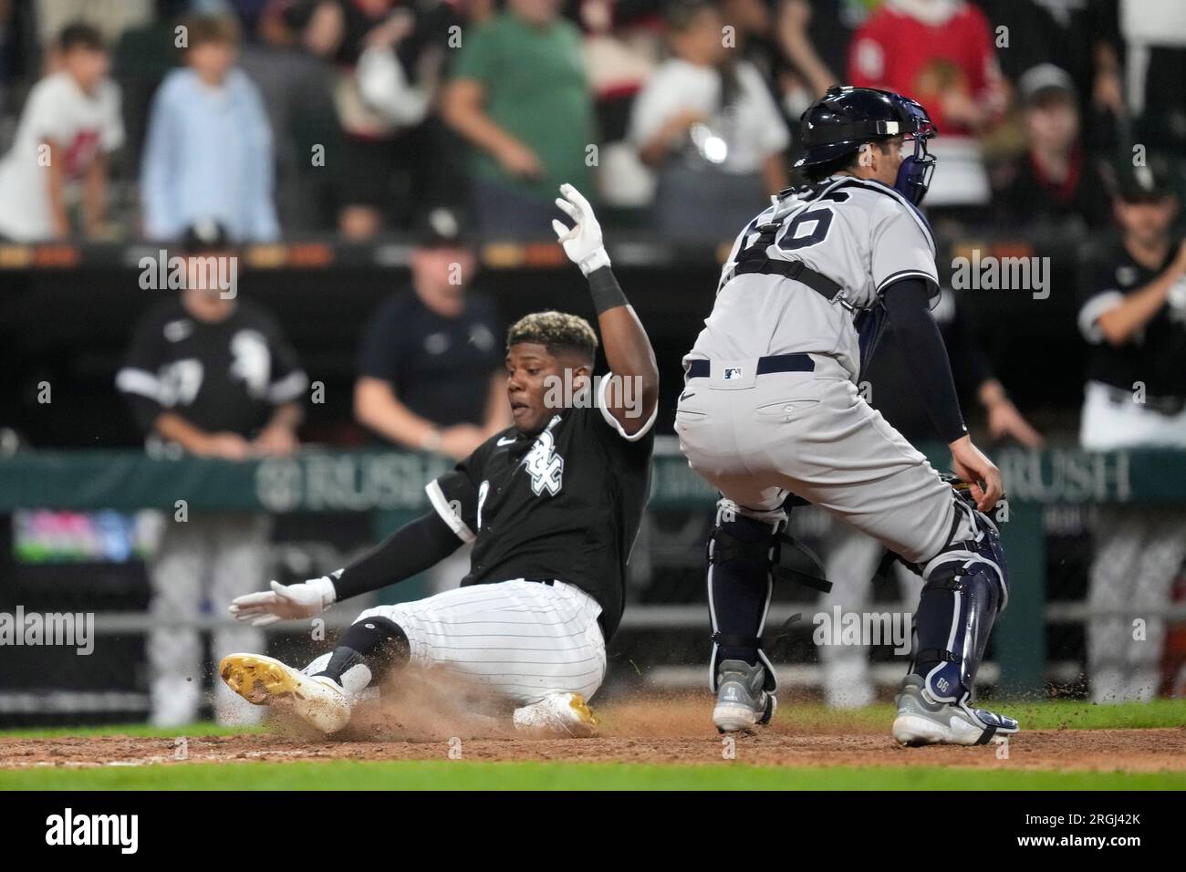Chicago White Sox's Oscar Colas scores past New York Yankees catcher ...