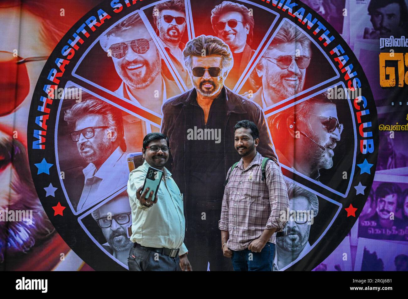 Fans of Indian actor Rajinikanth take selfies as they celebrate the ...