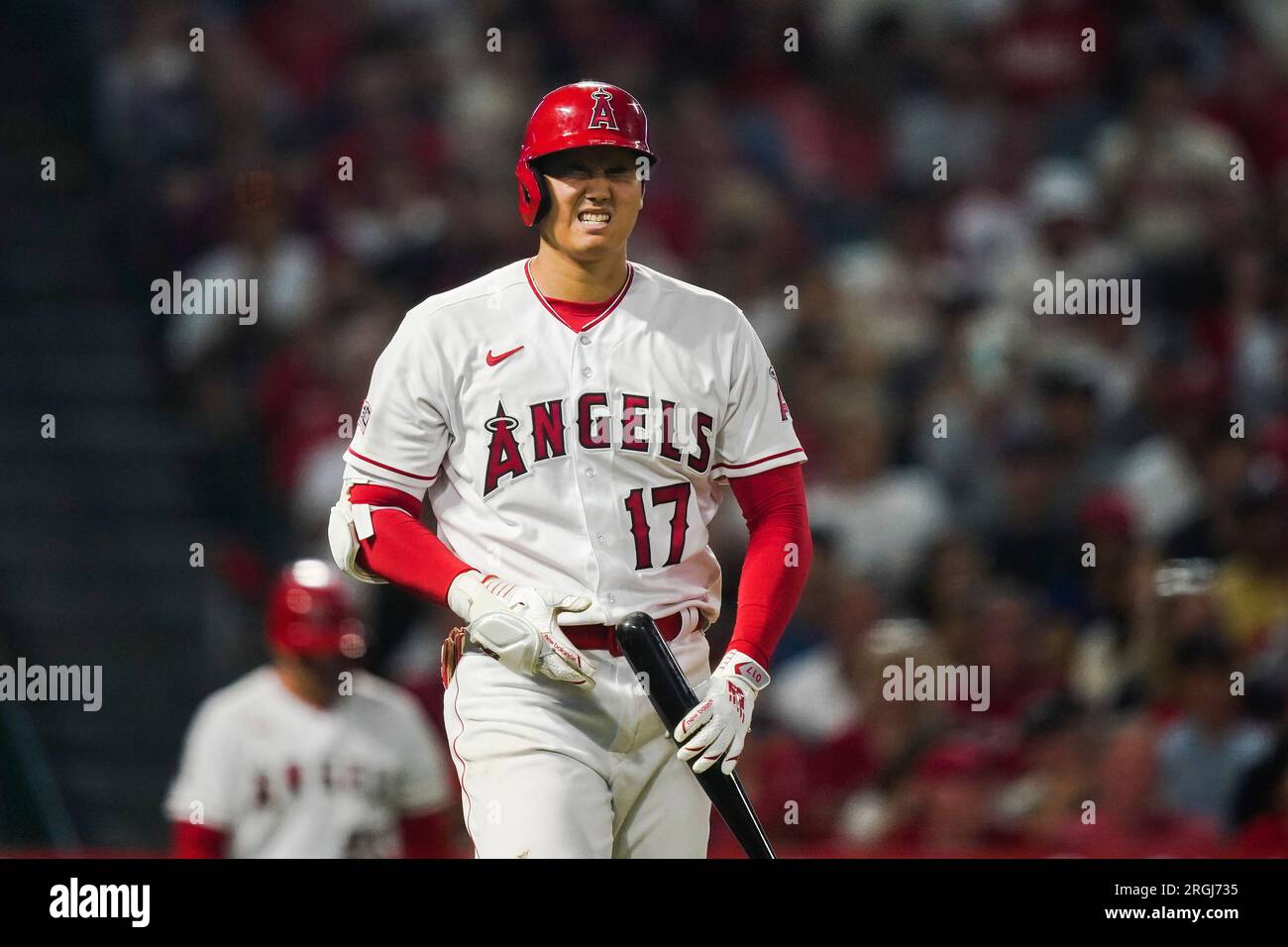 Los Angeles Angels' Shohei Ohtani reacts after drawing a walk from the ...