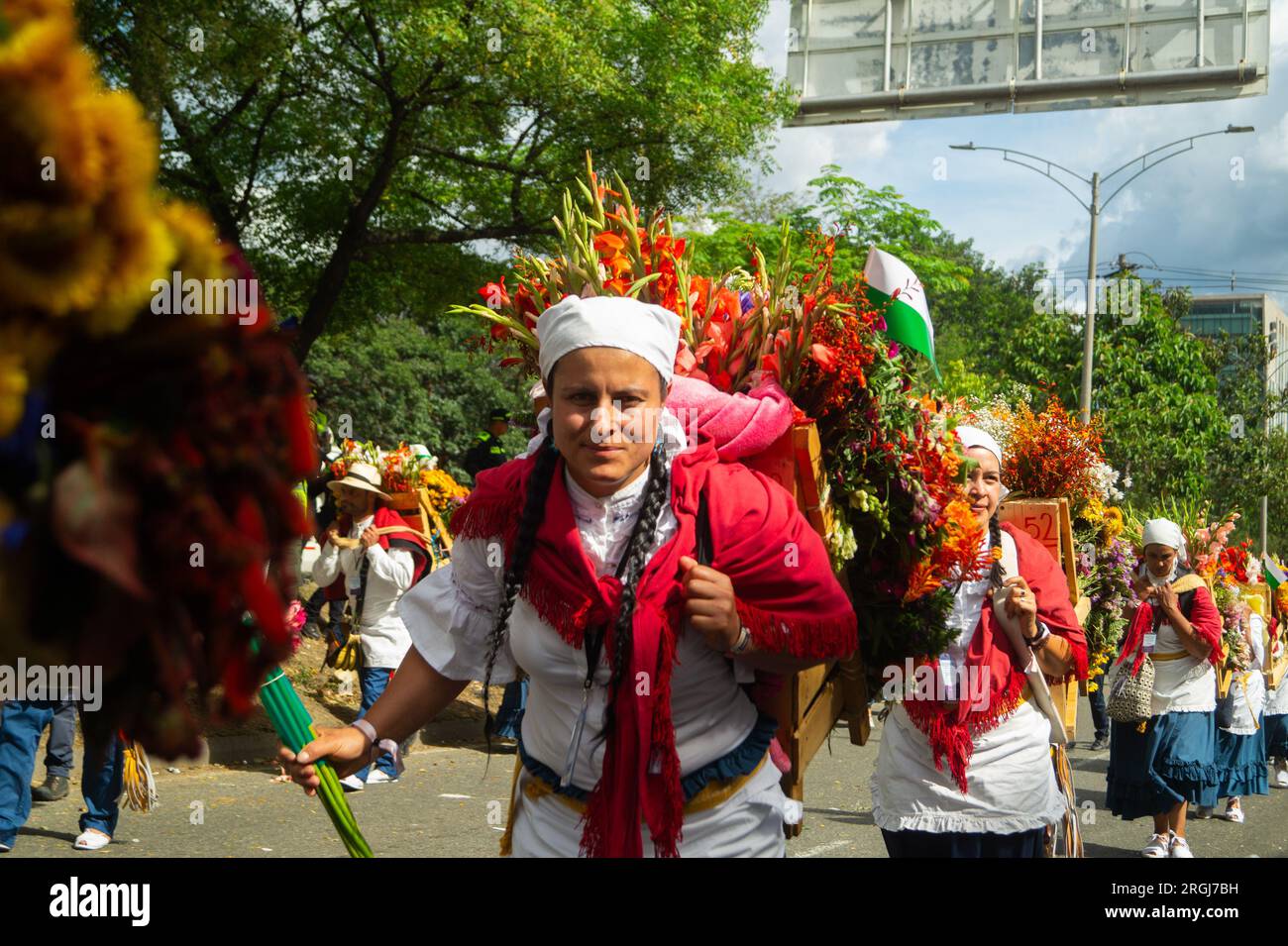 Medellin, Colombia. 07th Aug, 2023. People take part with flowers ...