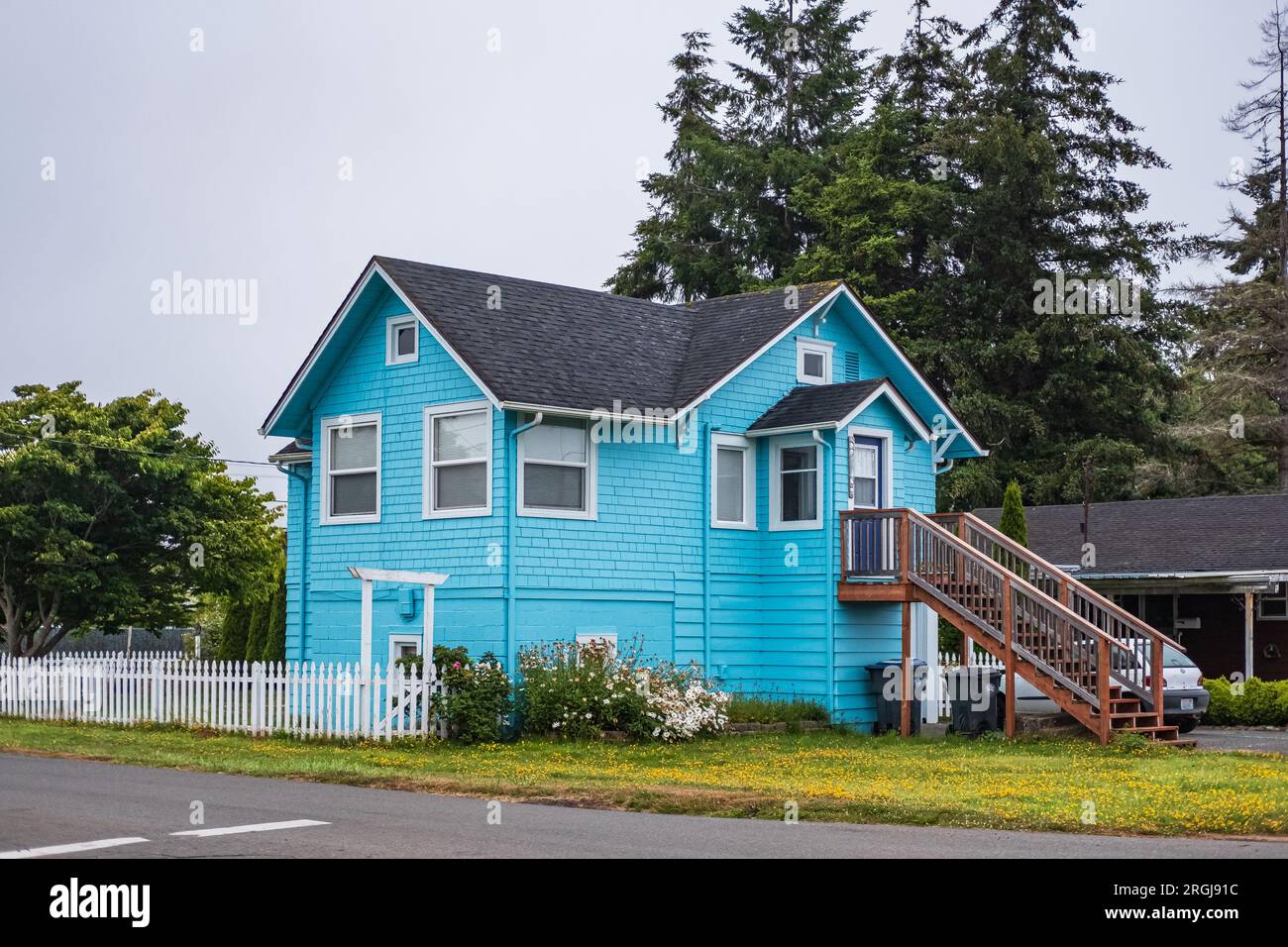 Small single-family house in America. Beautiful blue wooden house in a ...
