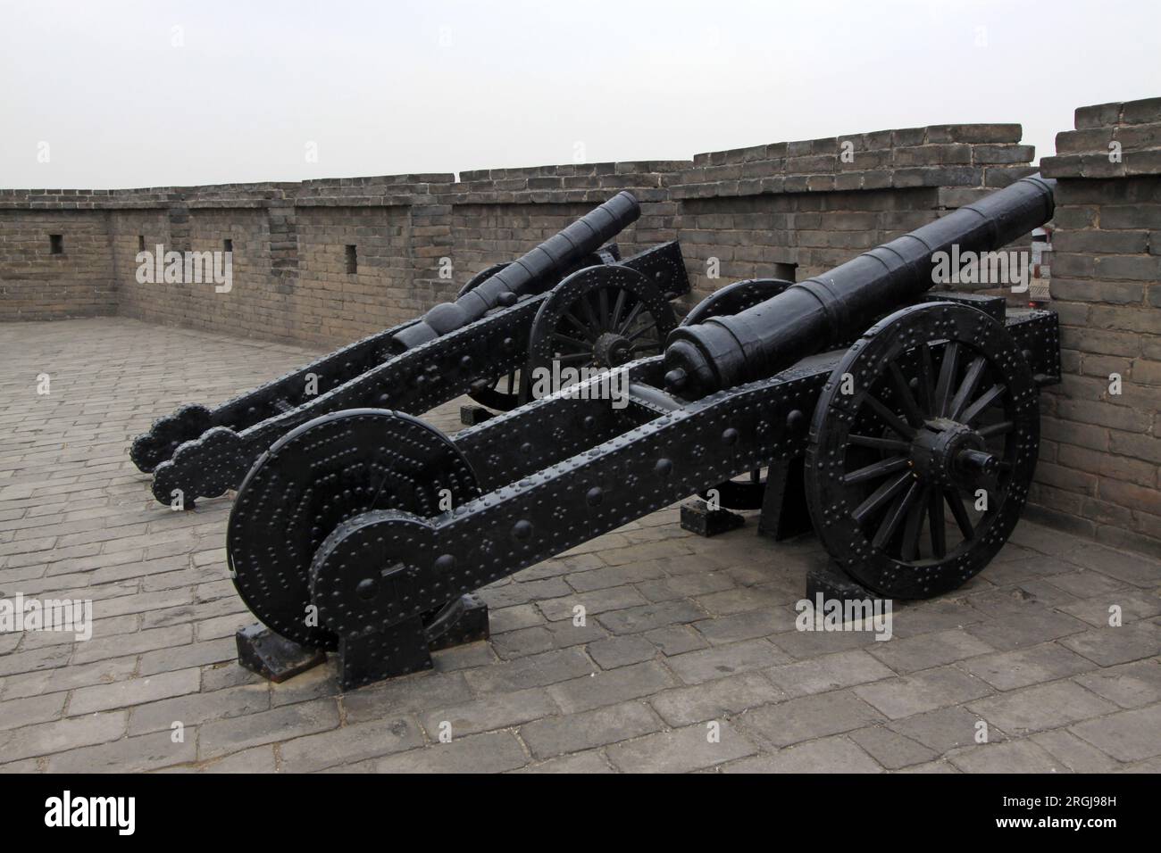 iron cannon in the ancient city walls, the ancient Chinese military ...