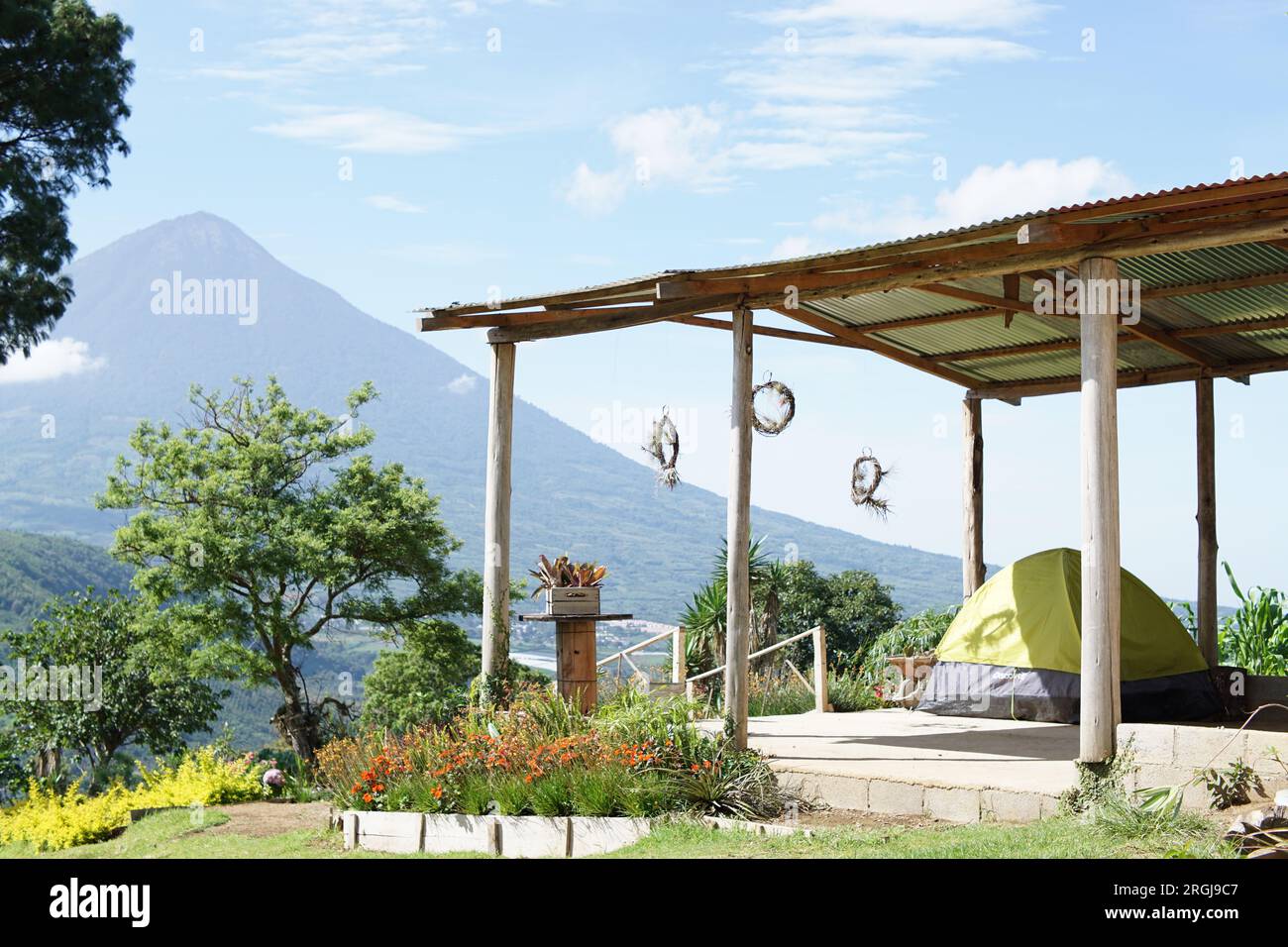 Peaceful camping site in Guatemala with Agua volcano on the background ...