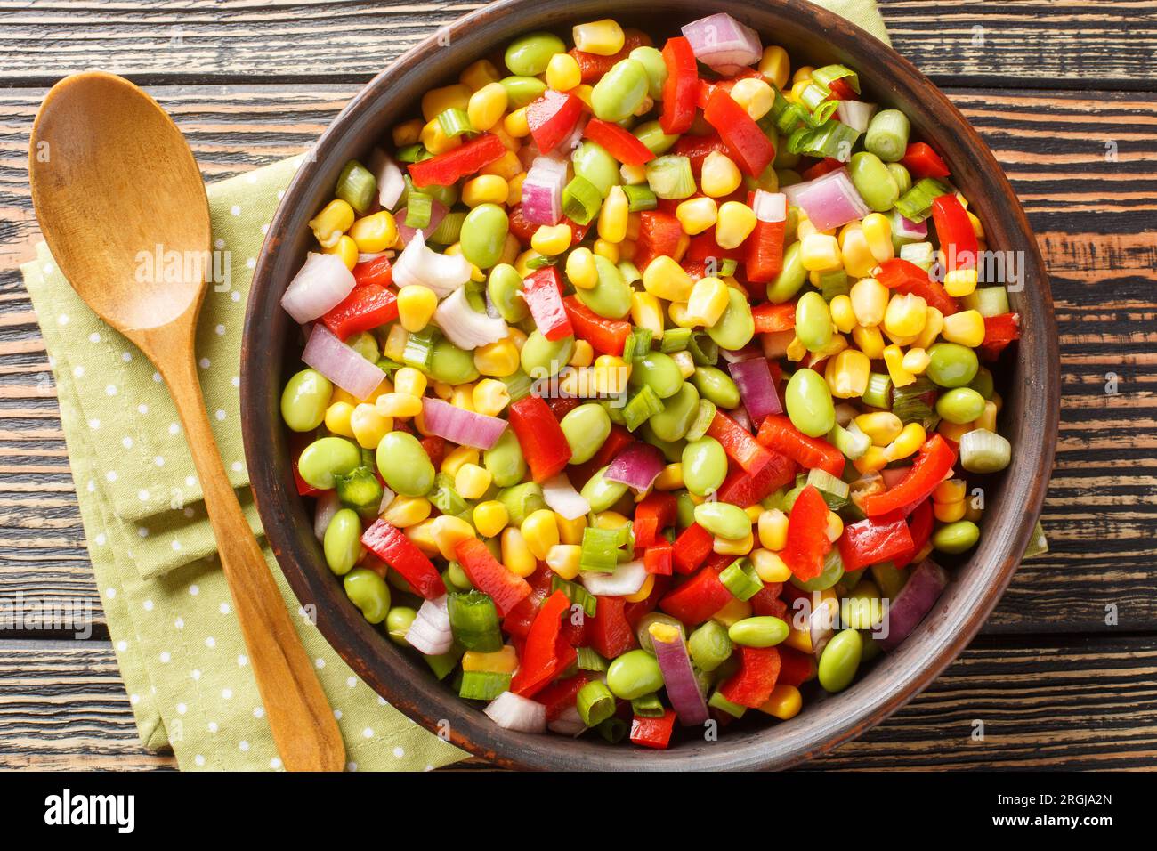 Delicious salad cooked with edamame soybeans, bell peppers, corn ...