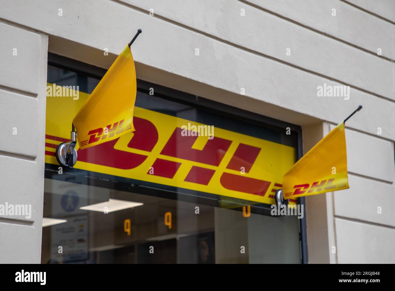 Milan , Italy - 08 07 2023 : dhl logo brand and text sign on facade ...