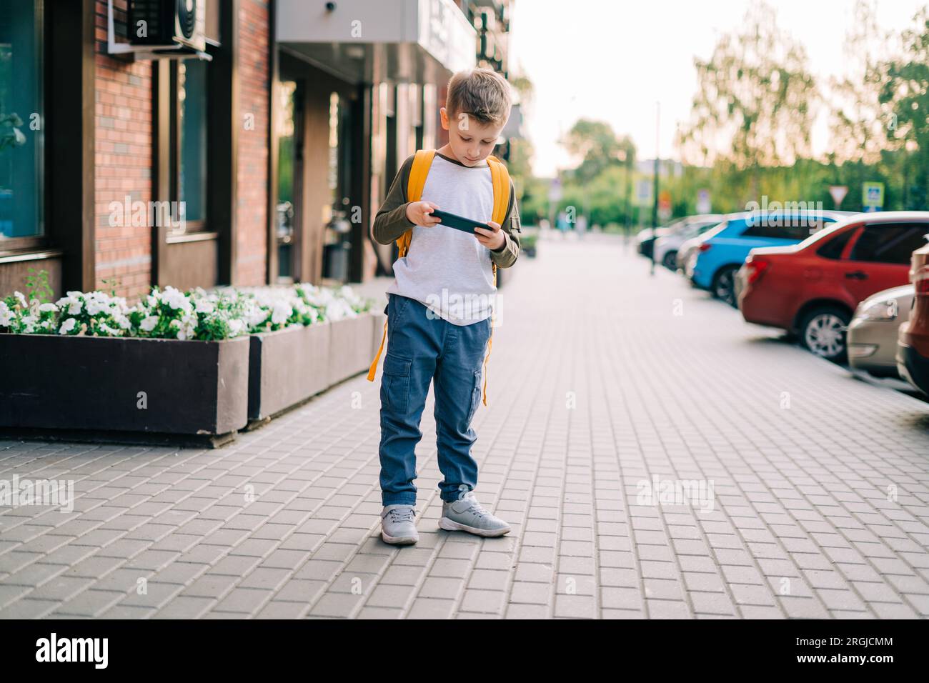 Back to school. Cute child with backpack running and going study to ...