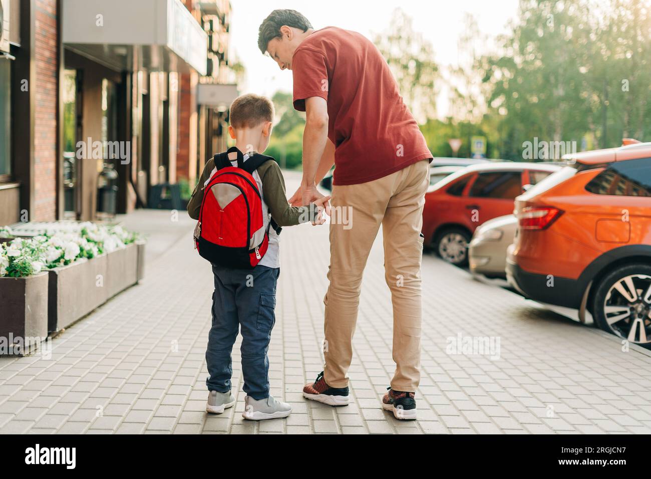 Happy father and kid son going to classes. Parent take child boy to ...