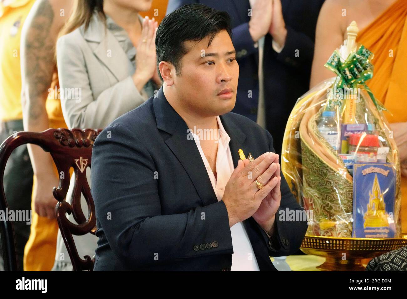 Vacharaesorn Vivacharawongse prays during a religious ceremony at ...