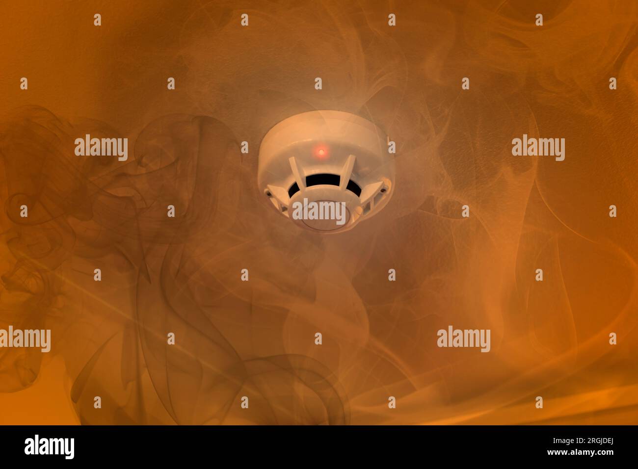 smoke detector in the ceiling, emergency fire alarm at an apartment's ...