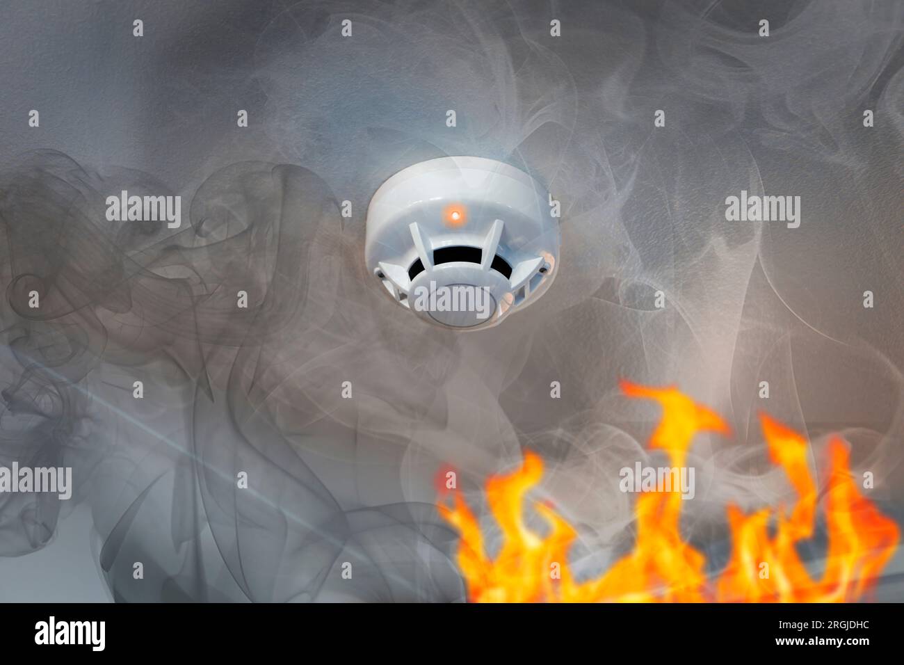 smoke detector in the ceiling, emergency fire alarm at an apartment's ...