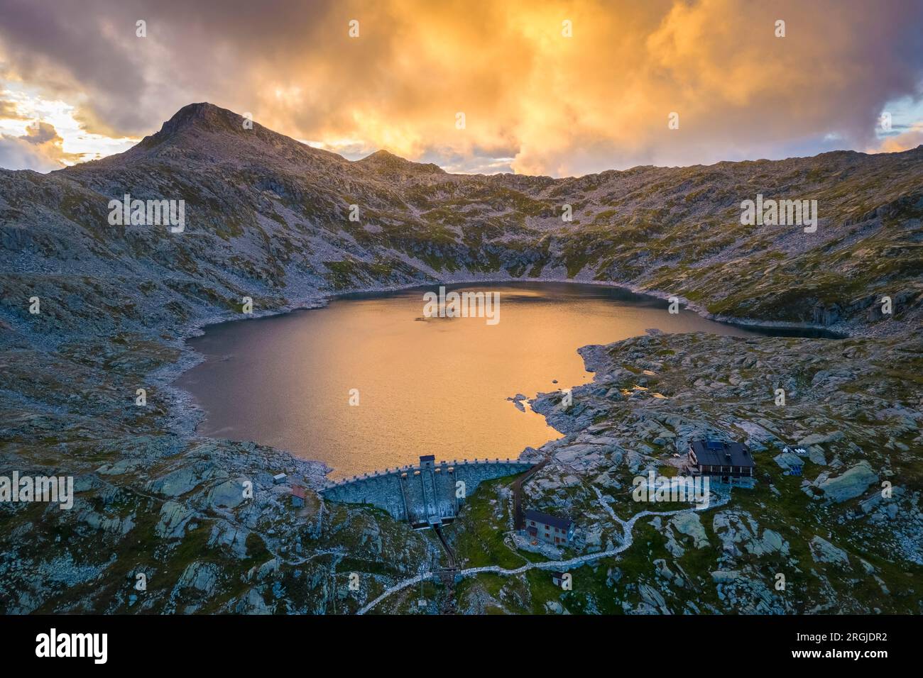 View of the Lago della Vacca at sunset. Breno, Valle del Caffaro ...