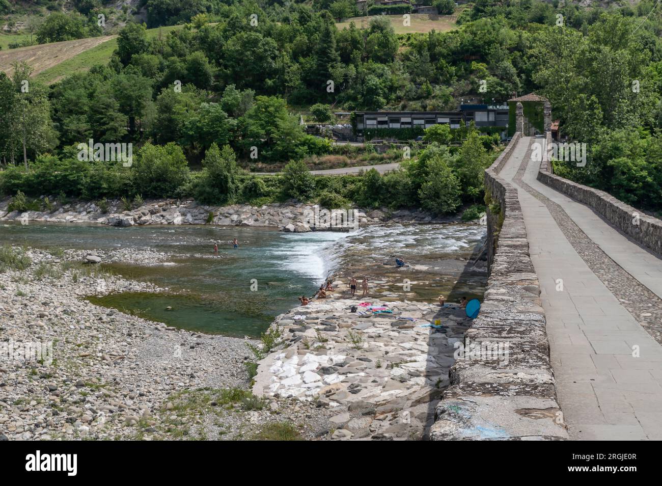 The Trebbia river seen from the ancient hunchback bridge of Bobbio ...