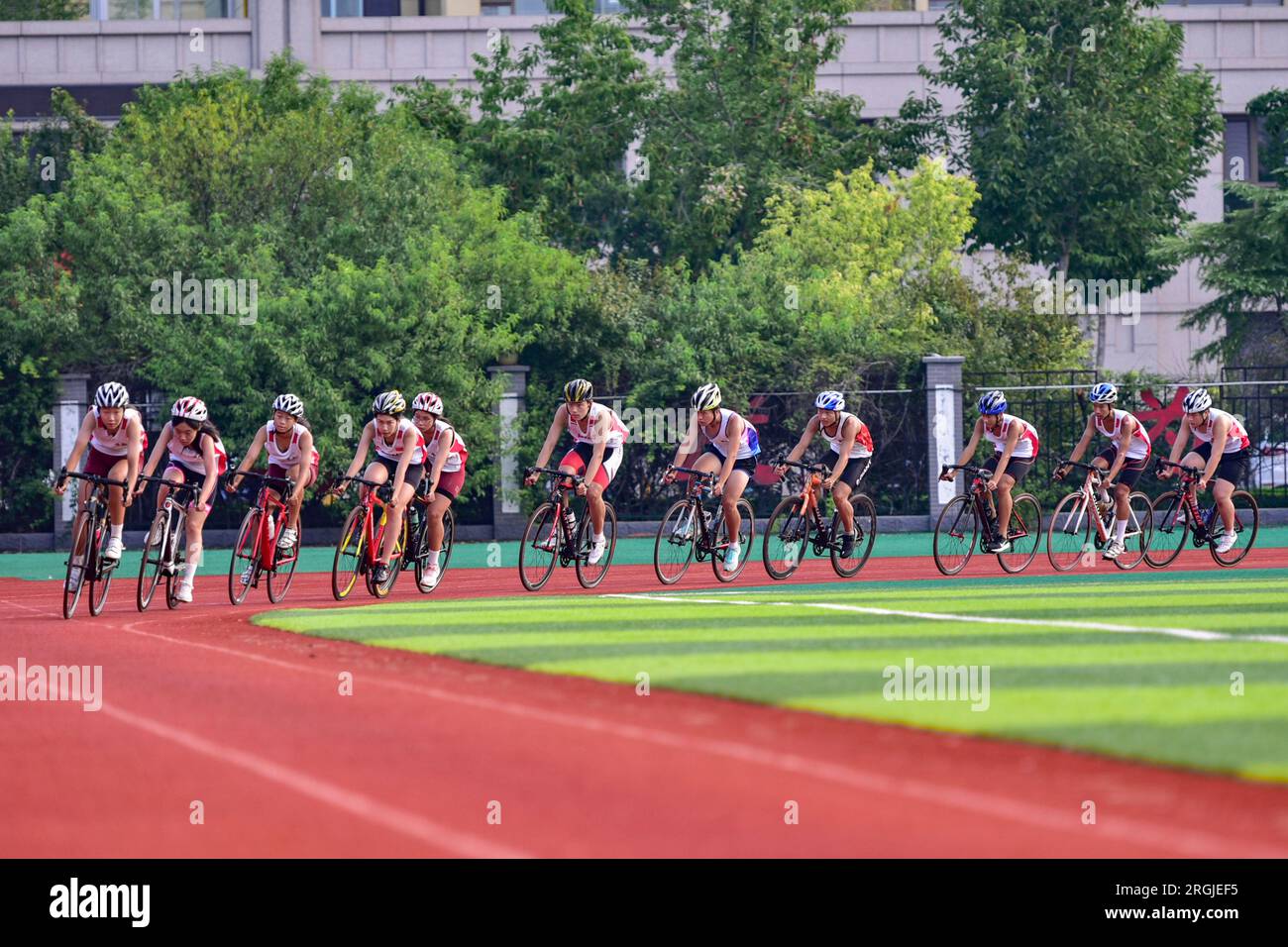 QINGZHOU, CHINA - AUGUST 10, 2023 - Students carry out bicycle training ...
