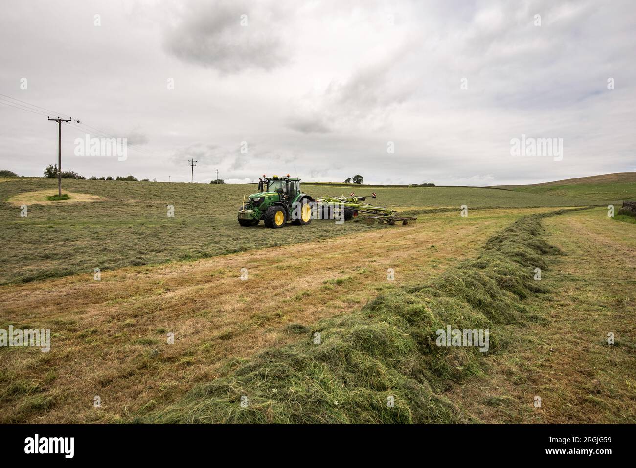 Tractor rowing up during silage making at Little Newton Long Preston ...