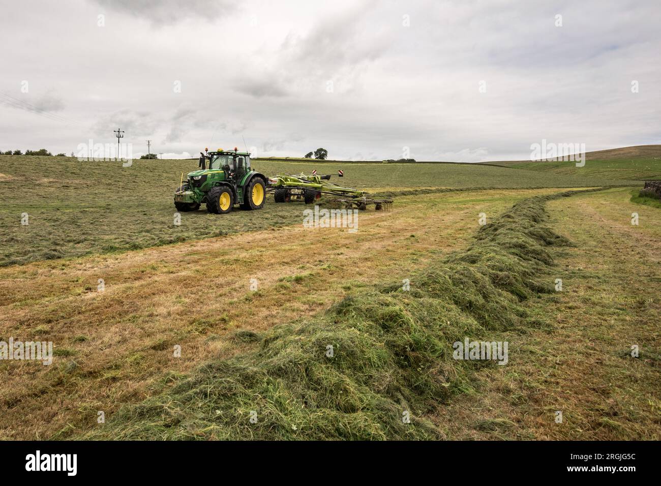 Tractor rowing up during silage making at Little Newton Long Preston ...