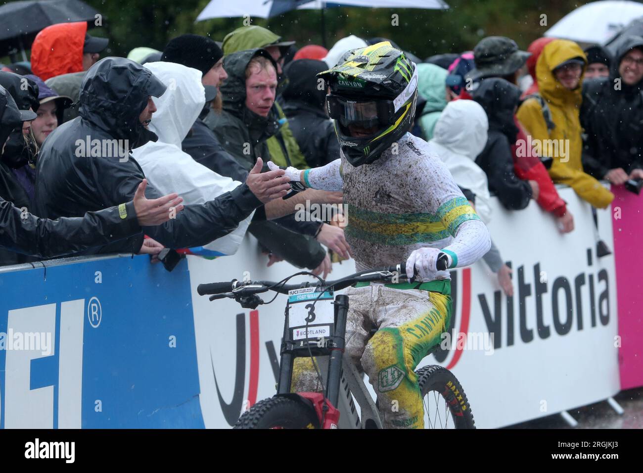 Australia's Troy Brosnan interacts with spectators in the Elite Men’s ...