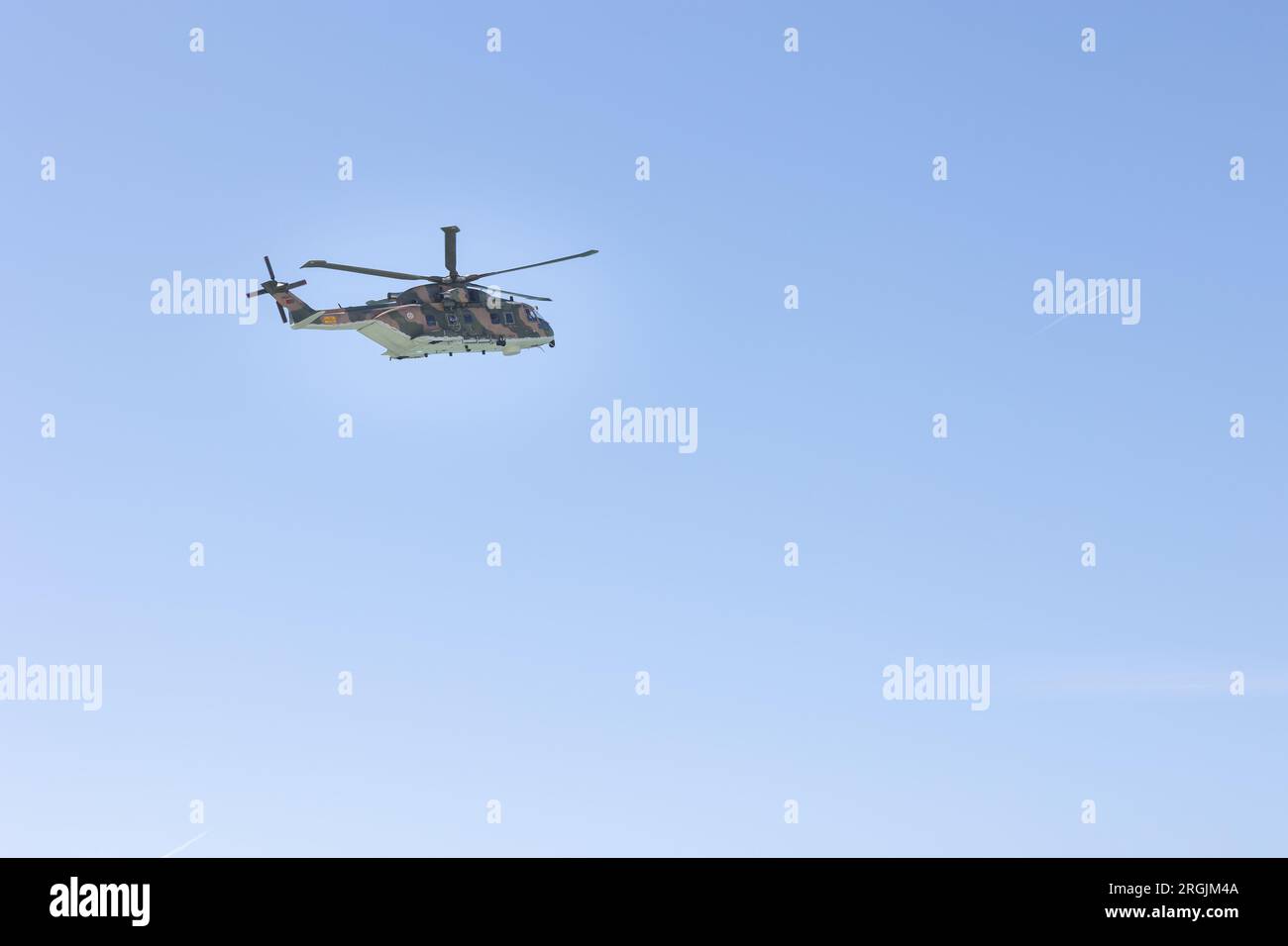 25 March 2023 Portugal, Costa da caparica: a helicopter flies in the ...