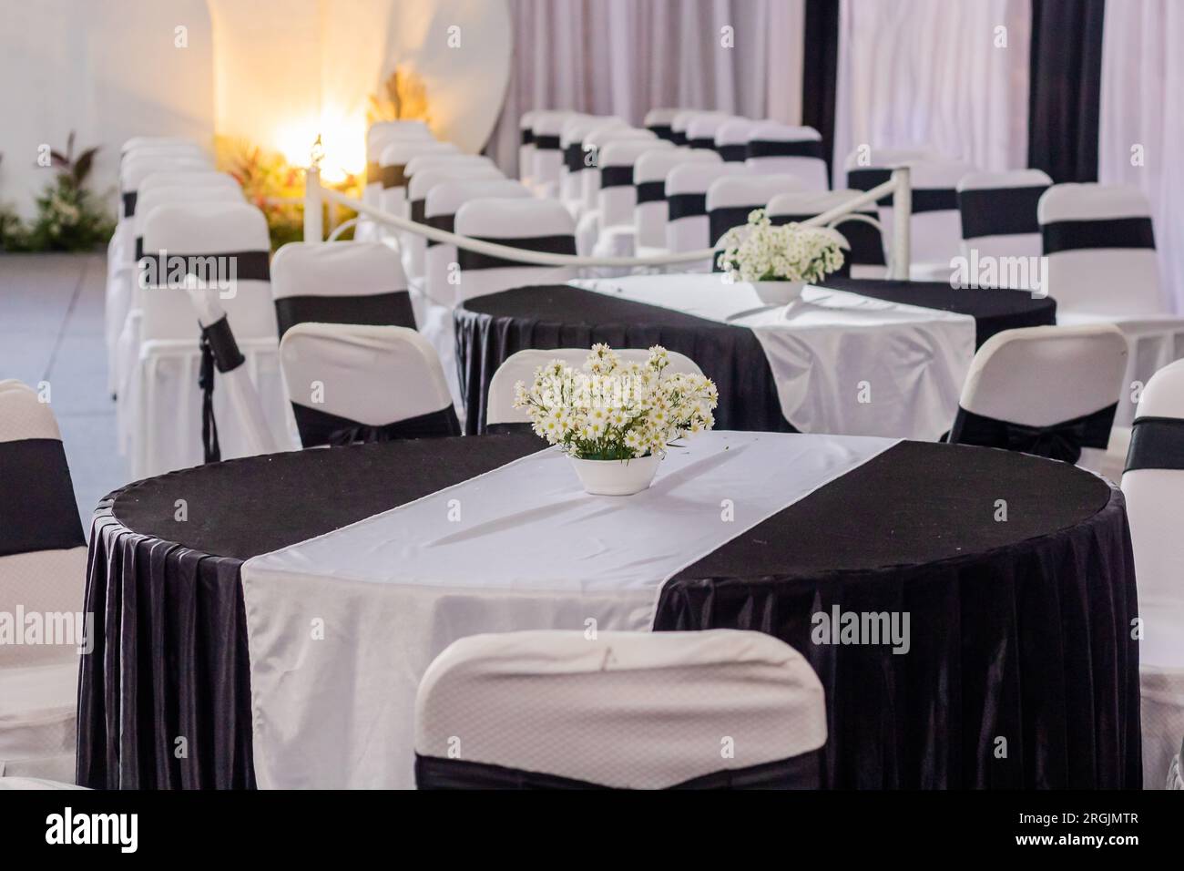 decoration of the wedding reception venue indoors with a neat ...