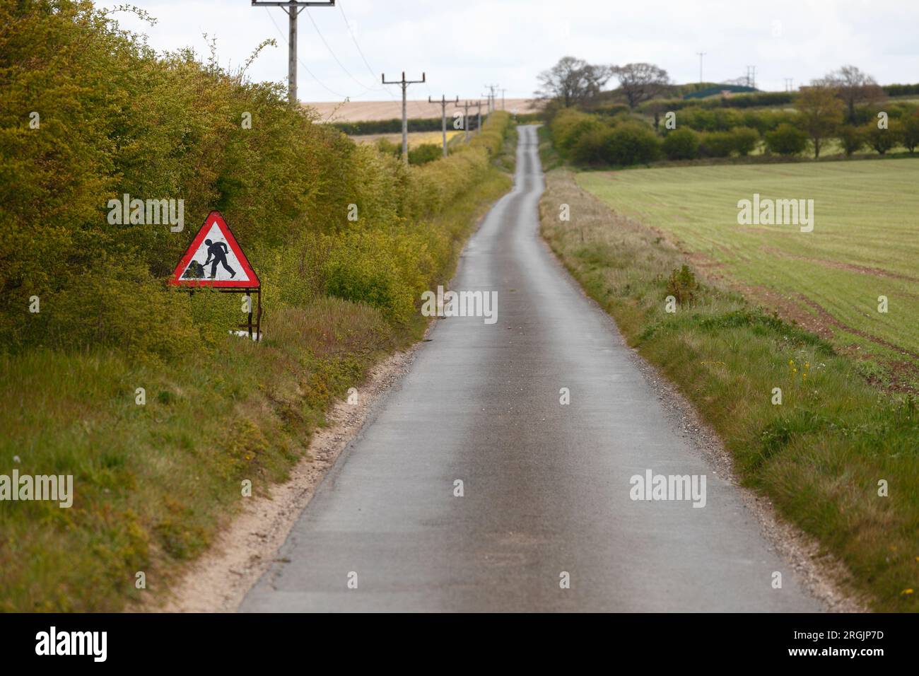 Men working on the road hi-res stock photography and images - Alamy