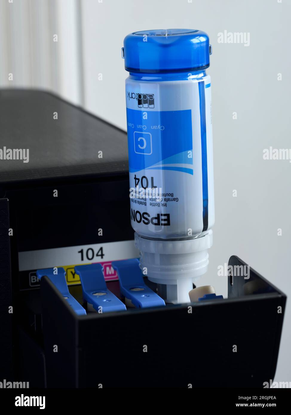Filling ink tank printer Stock Photo - Alamy