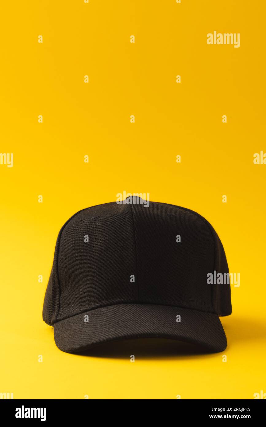 Yellow and black baseball cap hi-res stock photography and images - Alamy