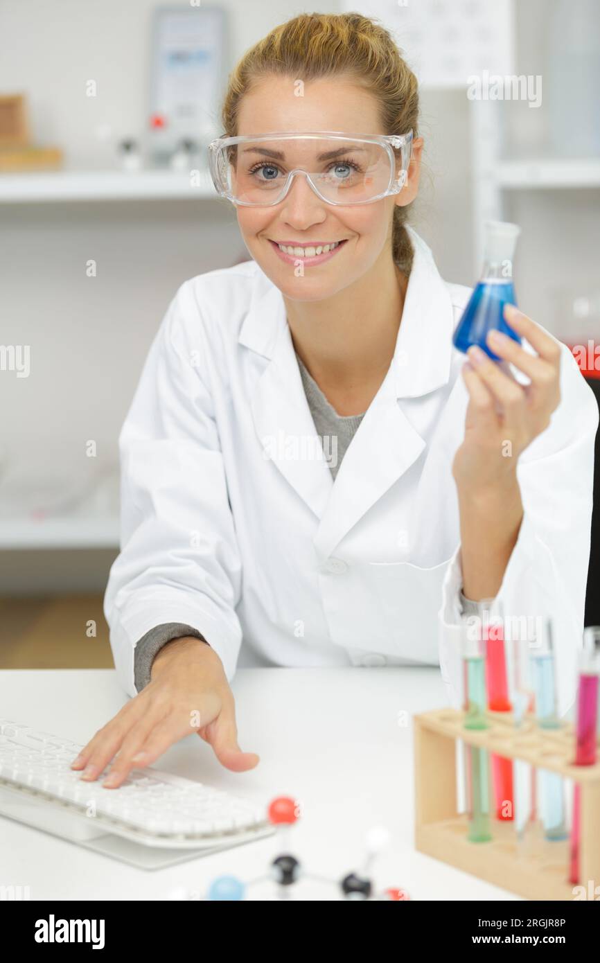 happy woman in lab Stock Photo - Alamy