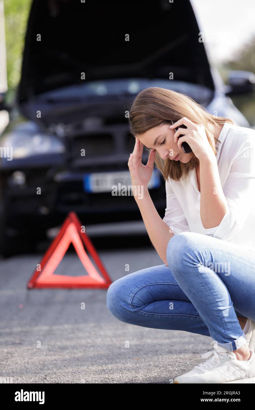 Young female driver calling hi-res stock photography and images - Alamy