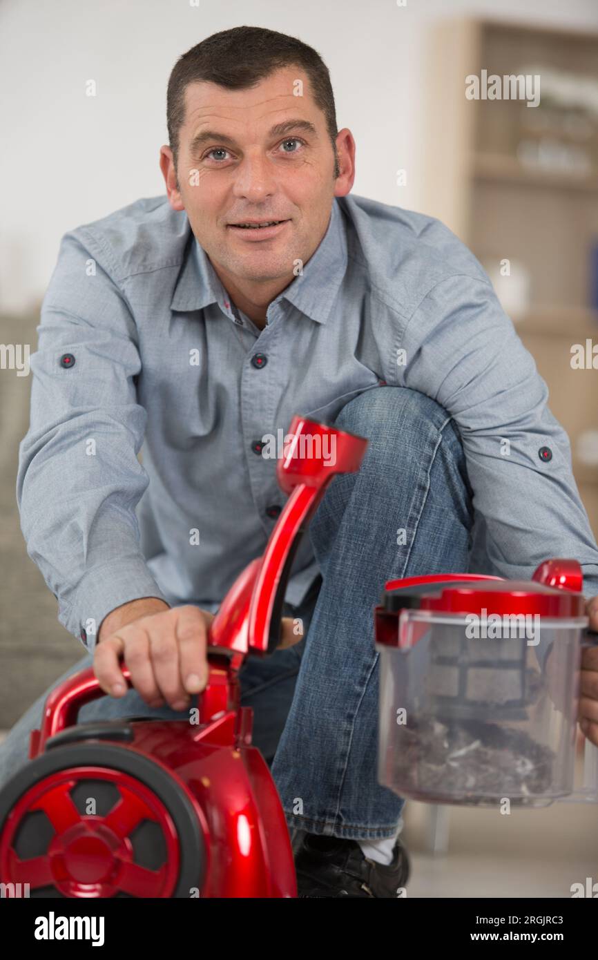 Emptying vacuum cleaner hi-res stock photography and images - Alamy