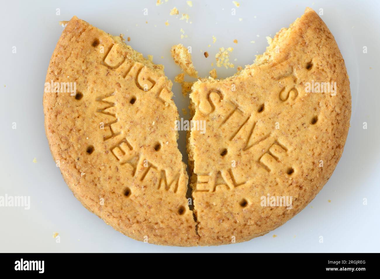 Broken sugar free digestive biscuit Stock Photo - Alamy
