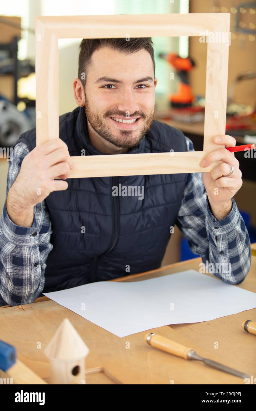 carpenter working on frame structure Stock Photo - Alamy
