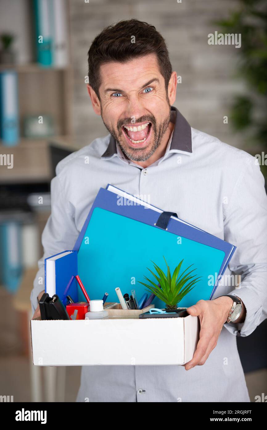 Happy man moving office hi-res stock photography and images - Alamy