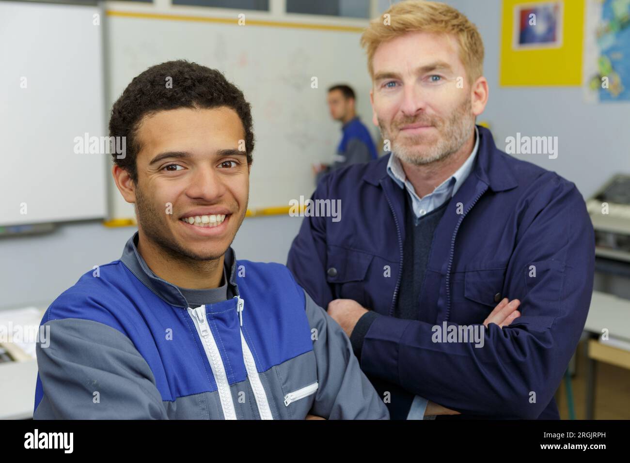 Two engineers examining building hi-res stock photography and images ...
