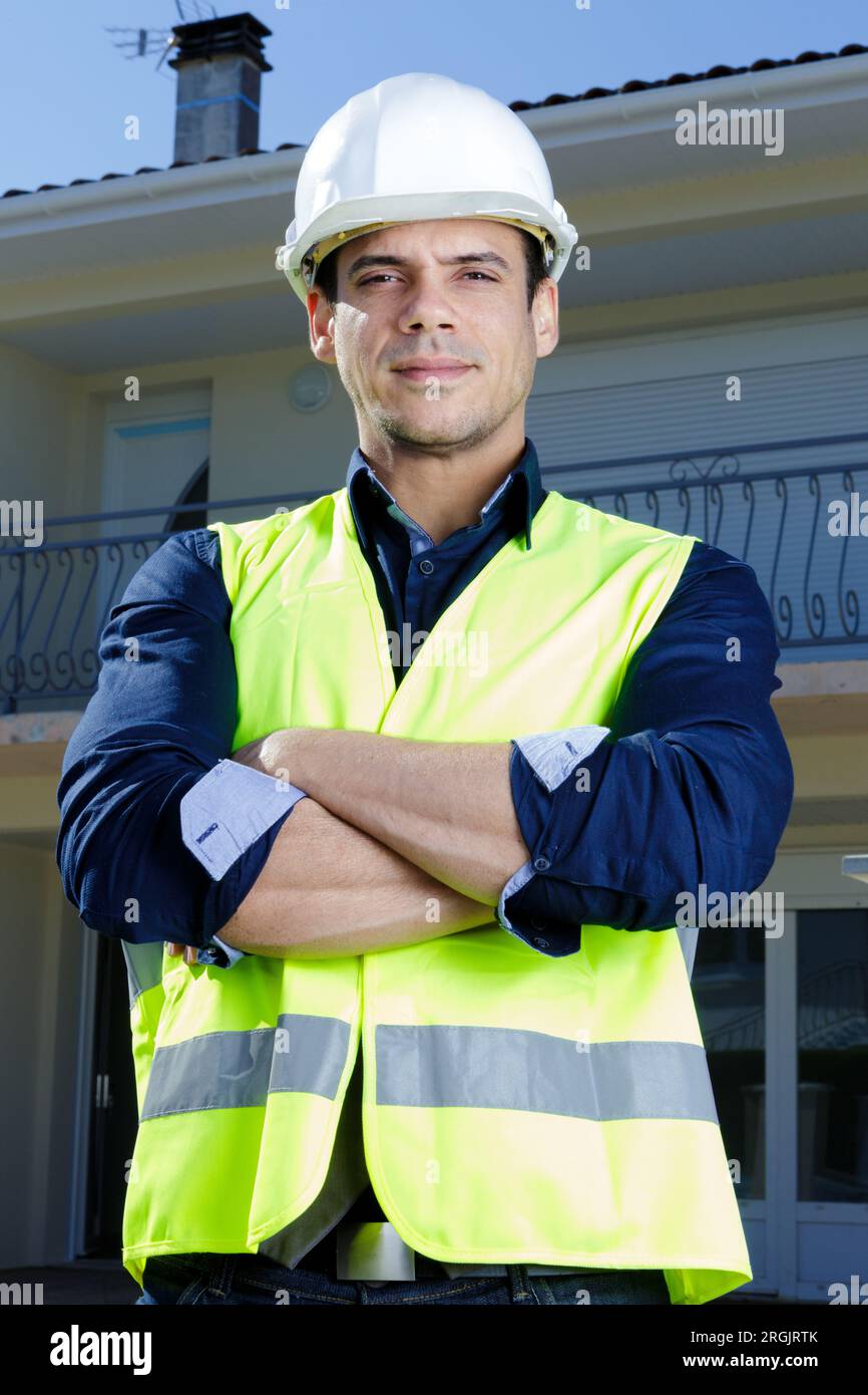 engineer standing confidently with a crossed arms Stock Photo - Alamy