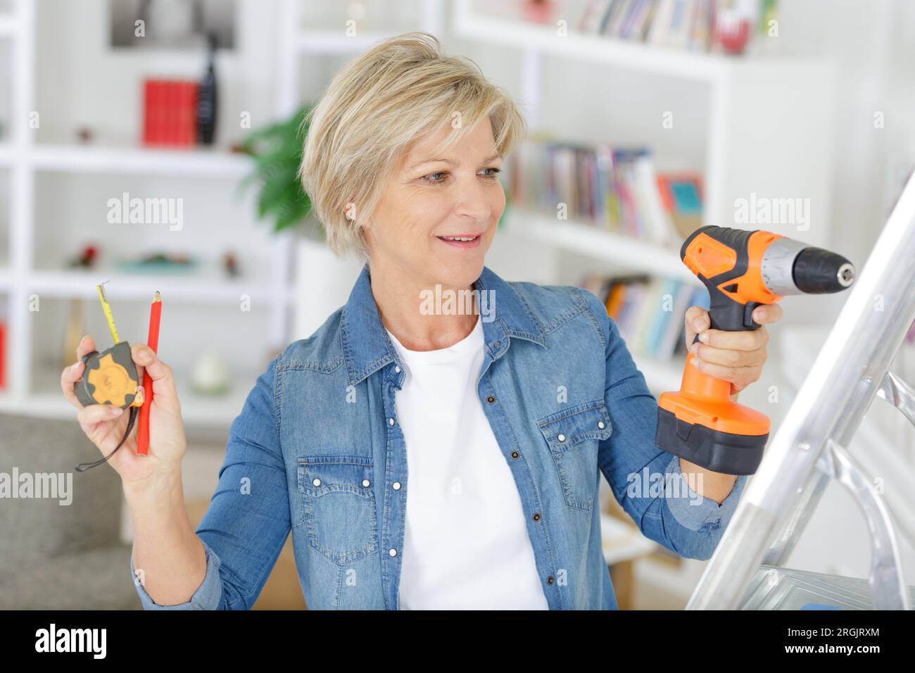Mature woman power tool hi-res stock photography and images - Alamy