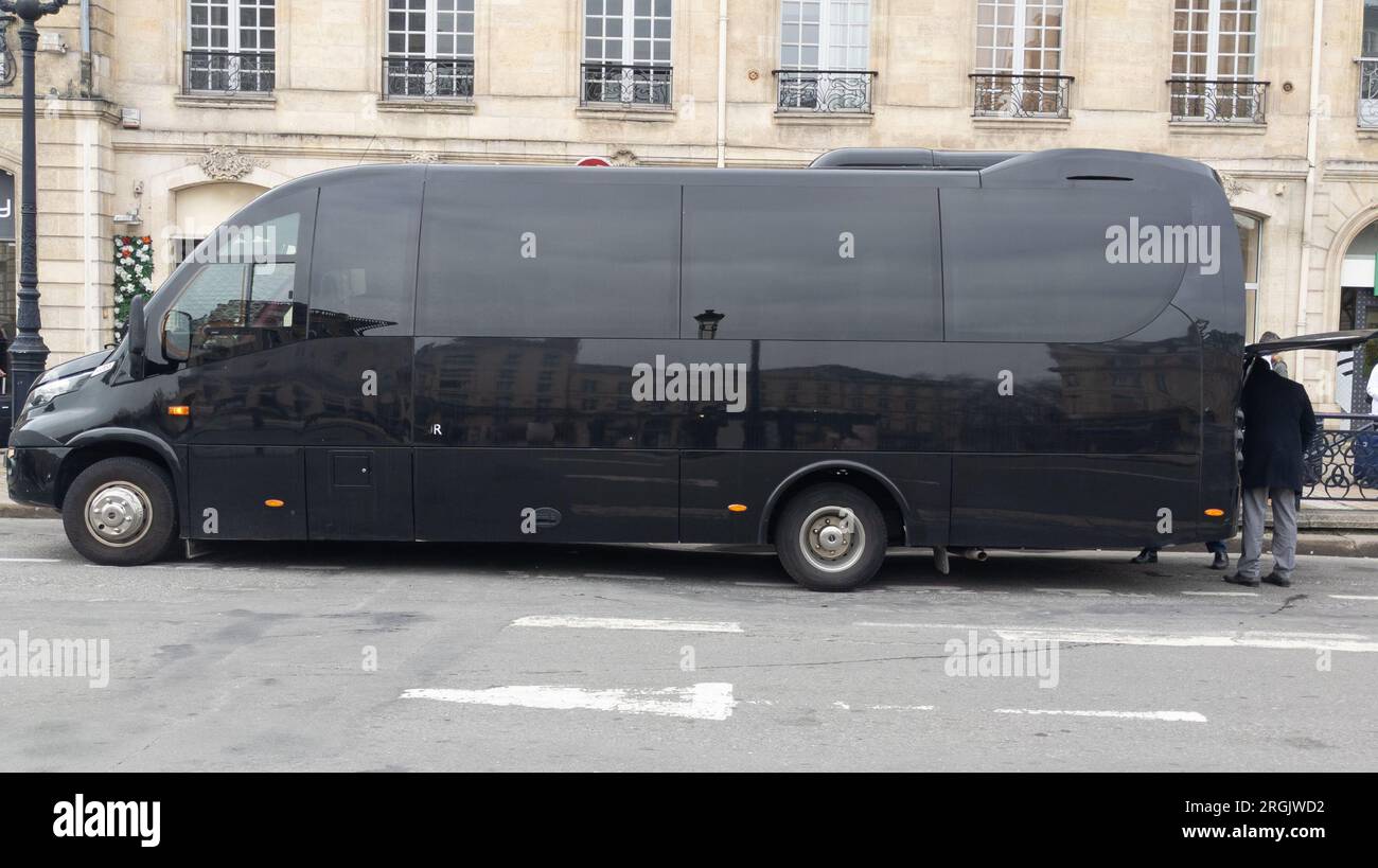 Tourist minibus black waiting with rear door open parking in tour ...
