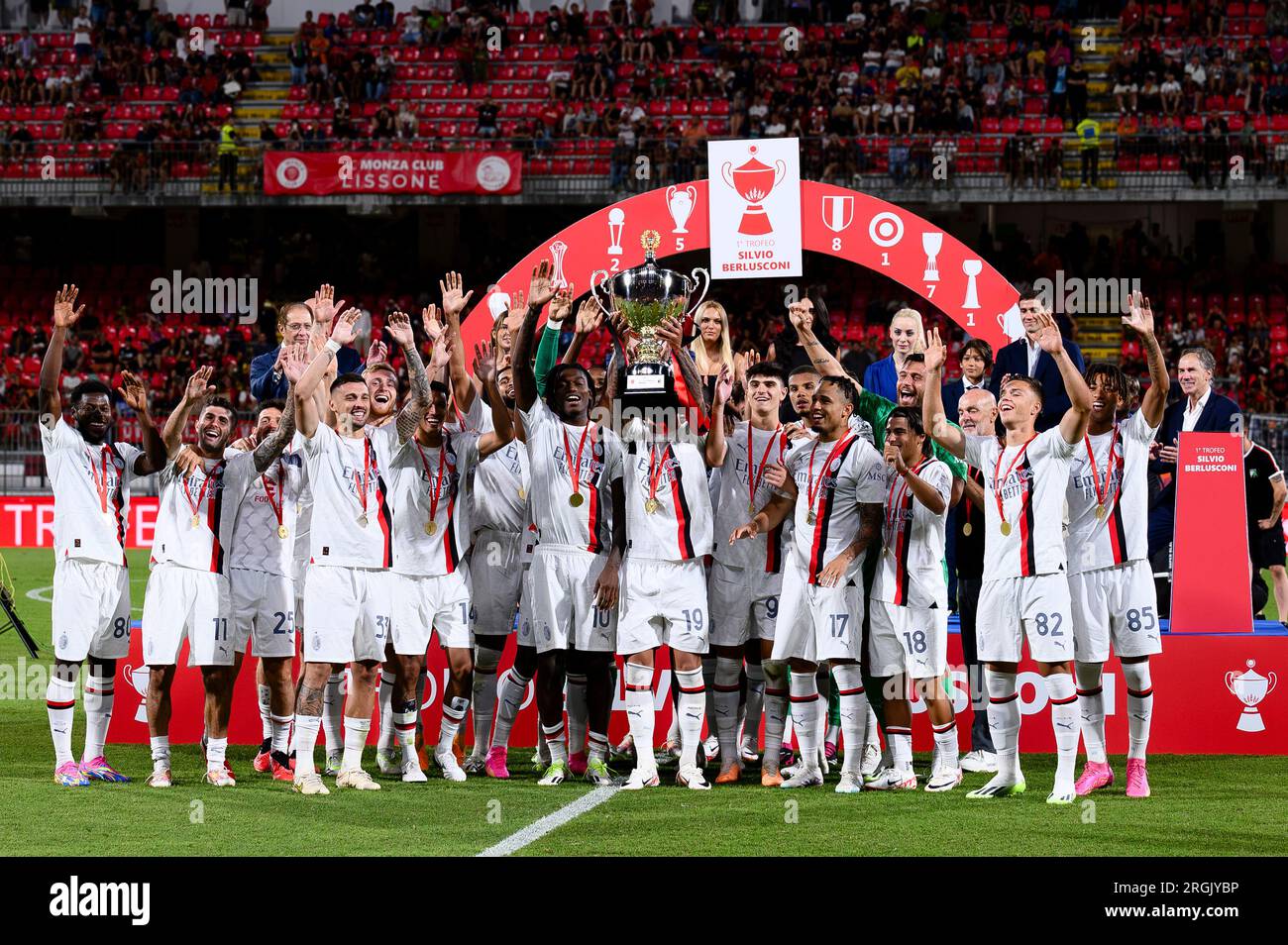 Players of AC Milan celebrate with hte trophy during the award ceremony ...