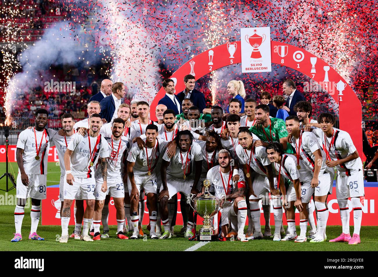Players of AC Milan celebrate with hte trophy during the award ceremony ...
