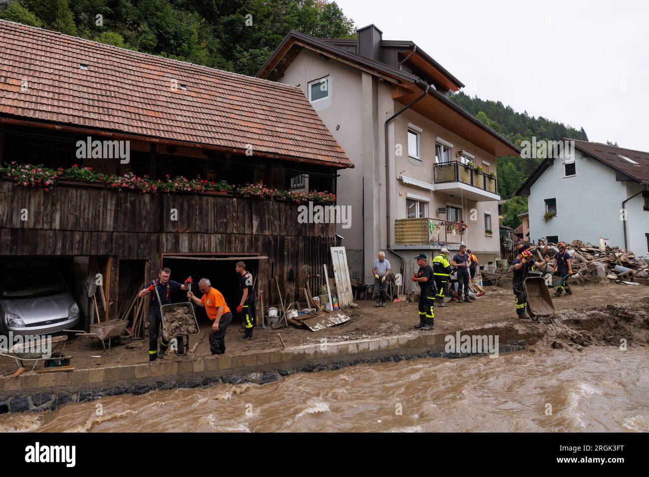Crna Na Koroskem, Slovenia. 09th Aug, 2023. Local residents and firemen ...