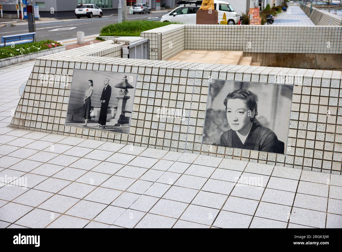 Stills from Yasujiro Ozu's film Tokyo Story (1953) on a wall along the ...