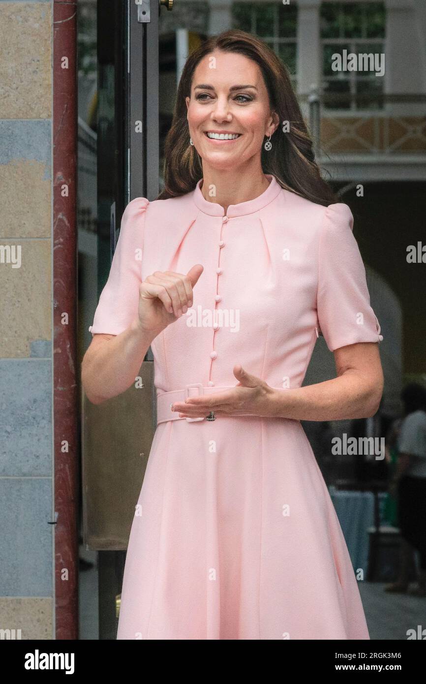 Catherine, the Princess of Wales, in a pink Belua dress, opens the ...