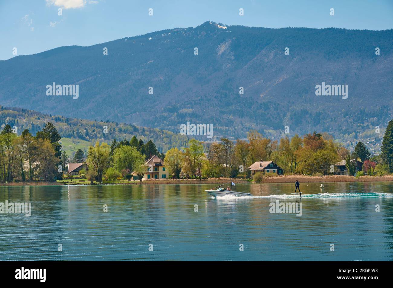 A landscape around Lake Annecy on a sunny day. Lake Annecy is a ...