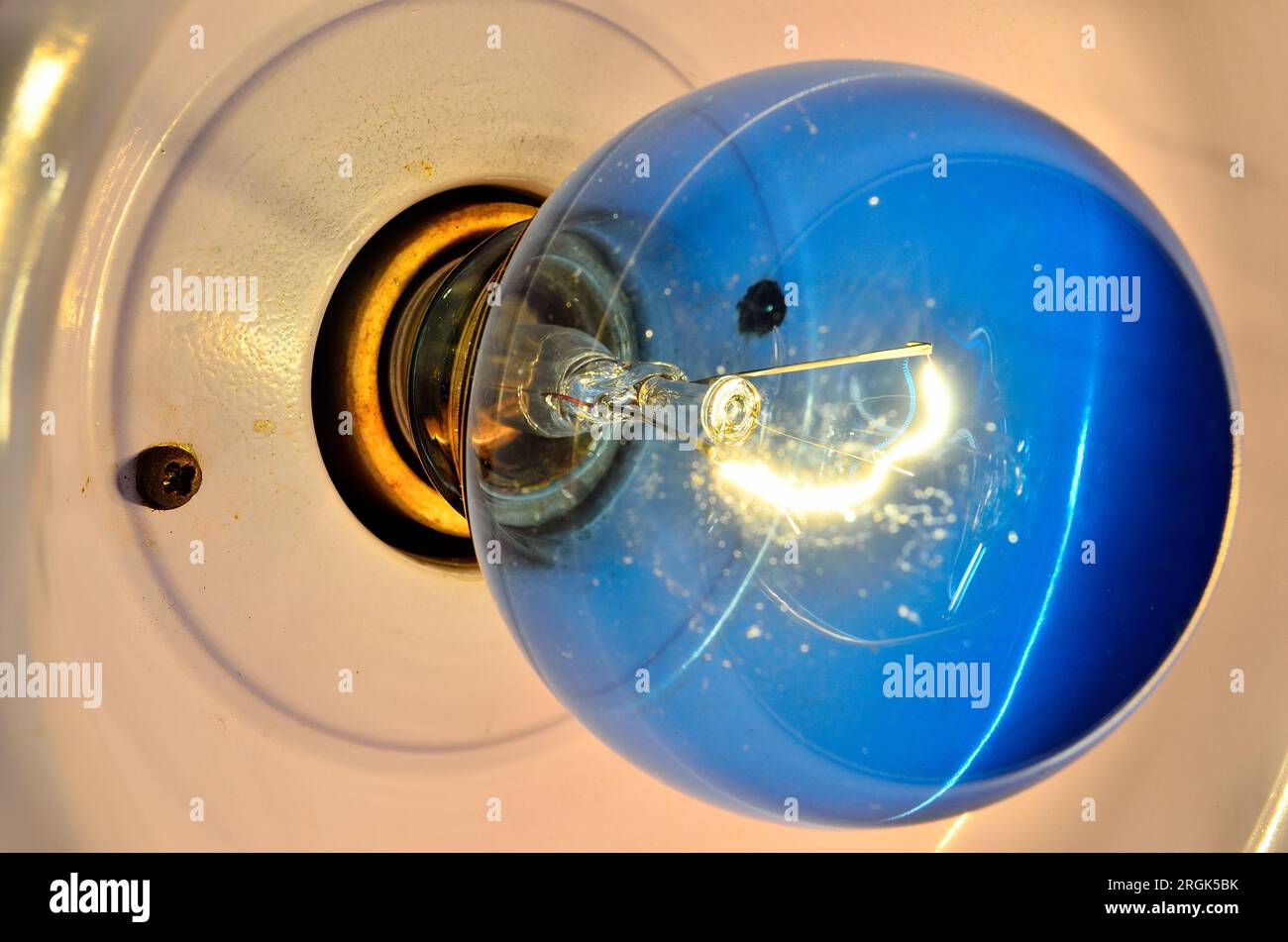 Wide angle close-up image of blue incandescent light bulb Stock Photo ...