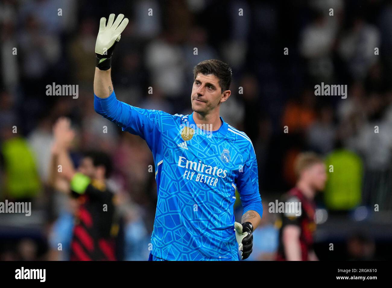 FILE - Real Madrid's goalkeeper Thibaut Courtois waves to fans at the ...