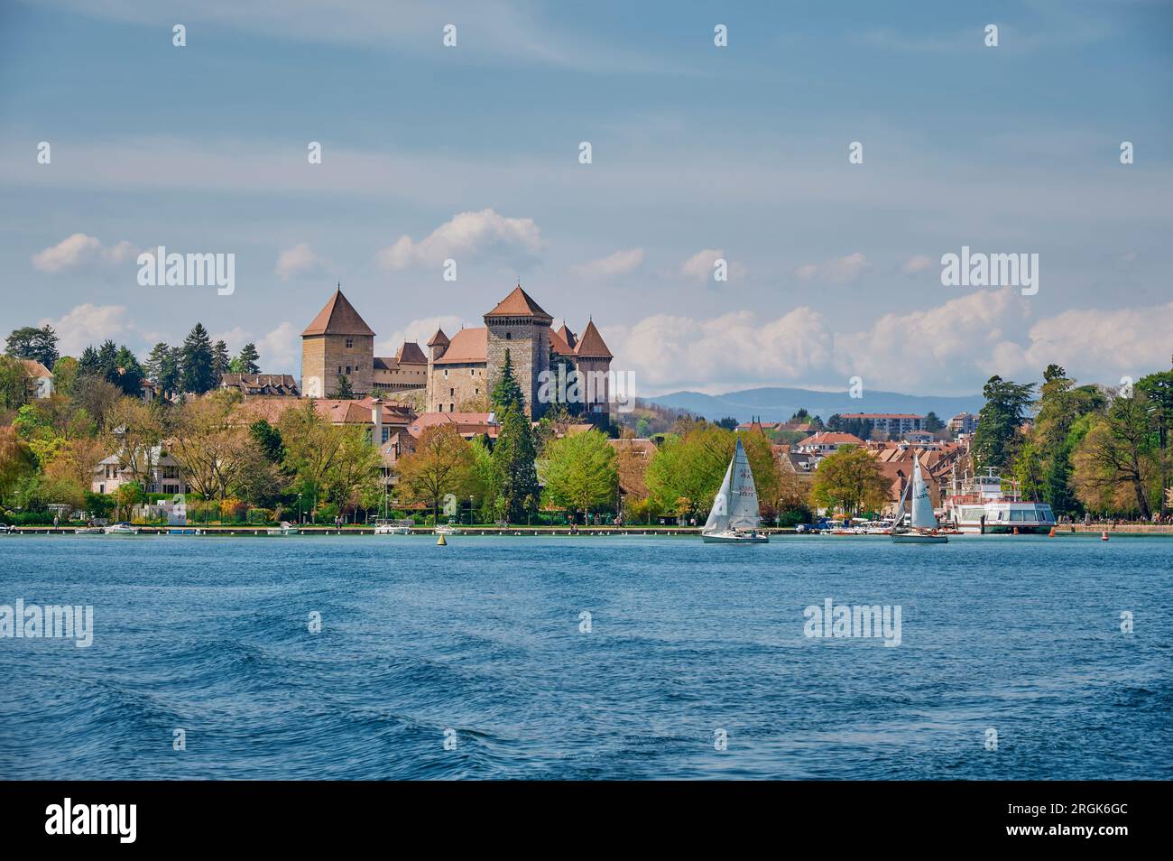 A landscape around Lake Annecy on a sunny day. Lake Annecy is a ...