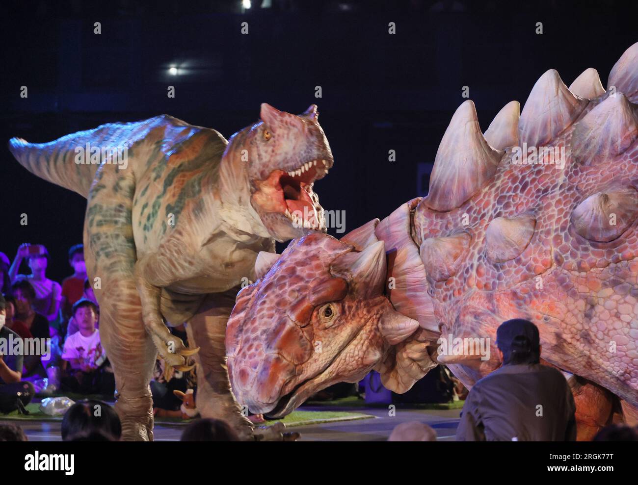 Yokohama, Japan. 10th Aug, 2023. Actors wearing dinosaur shaped ...