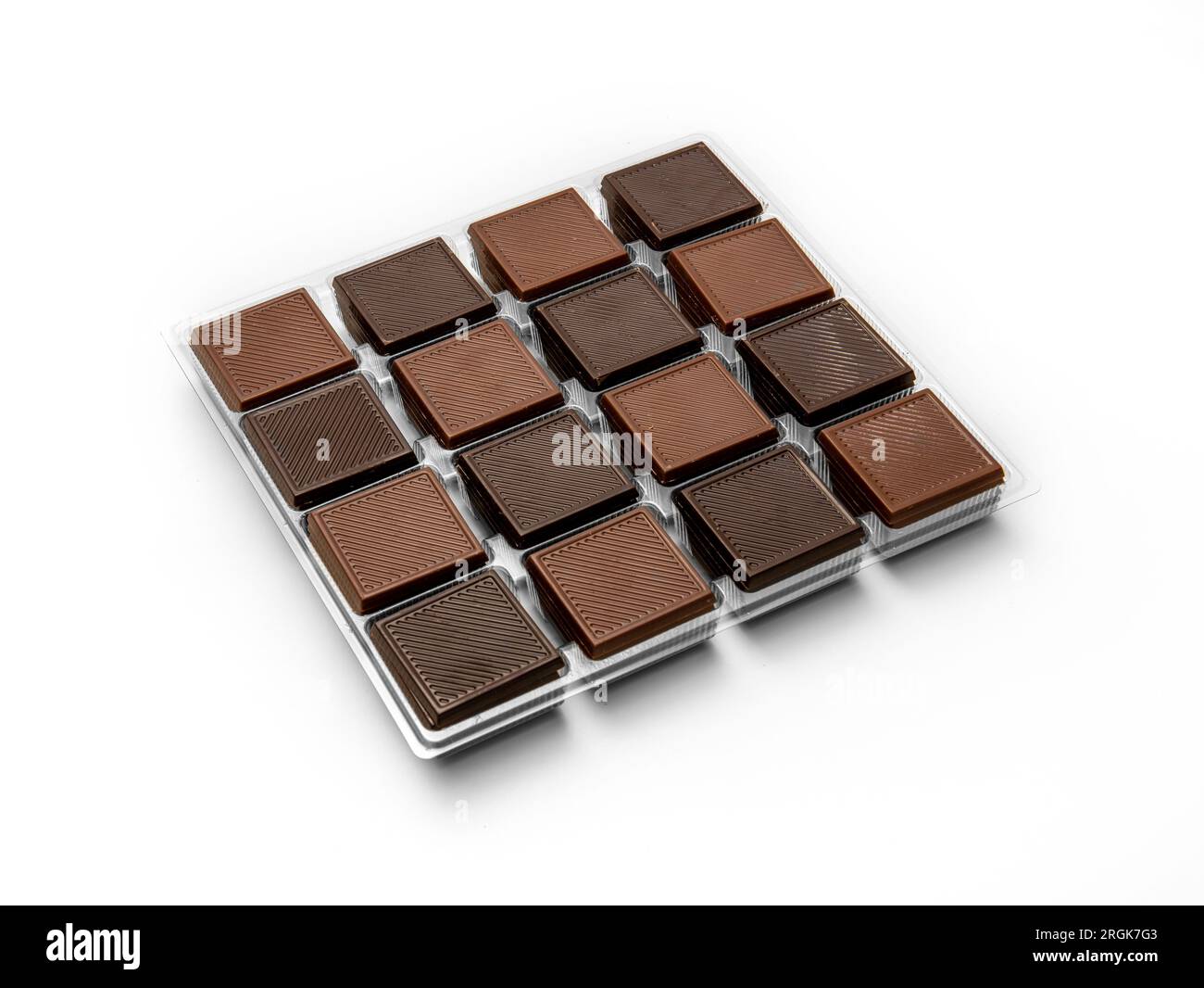 Milky and dark square chocolates. Isolated on white background Stock ...