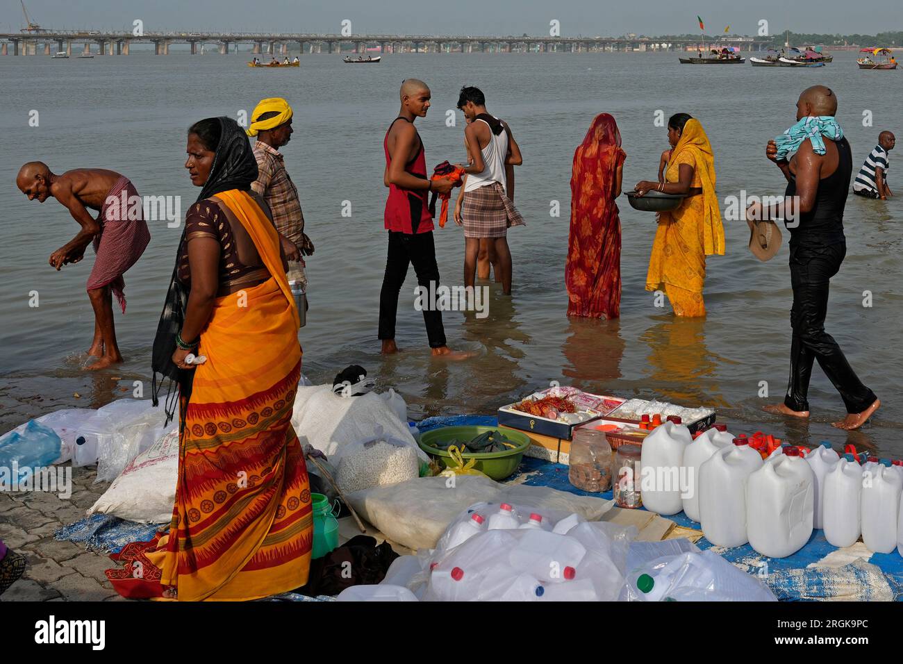 Hindu devotees bath and perform rituals at Sangam, the confluence of ...