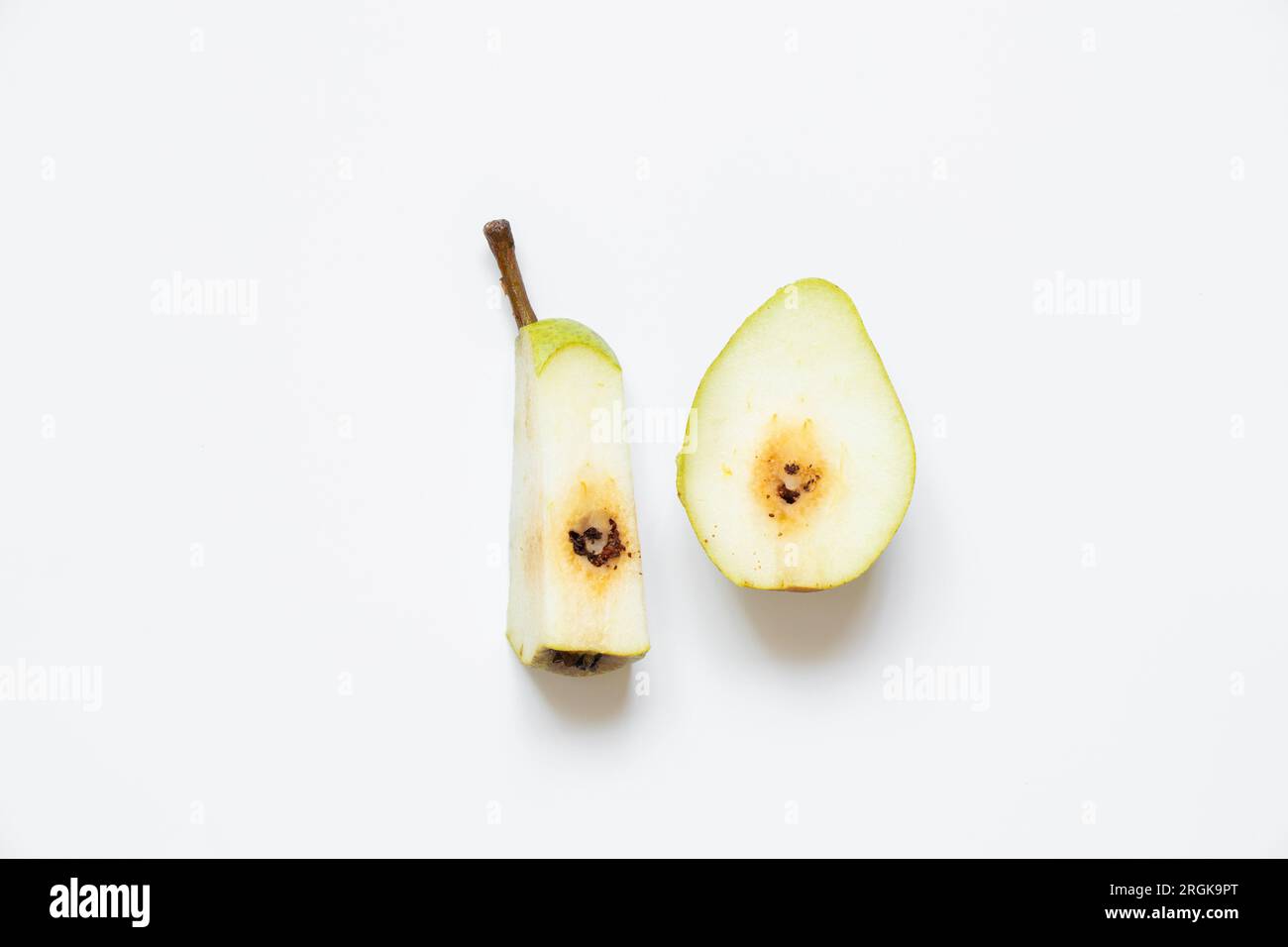 Sliced pear with a worm on a white background, fruit Stock Photo - Alamy